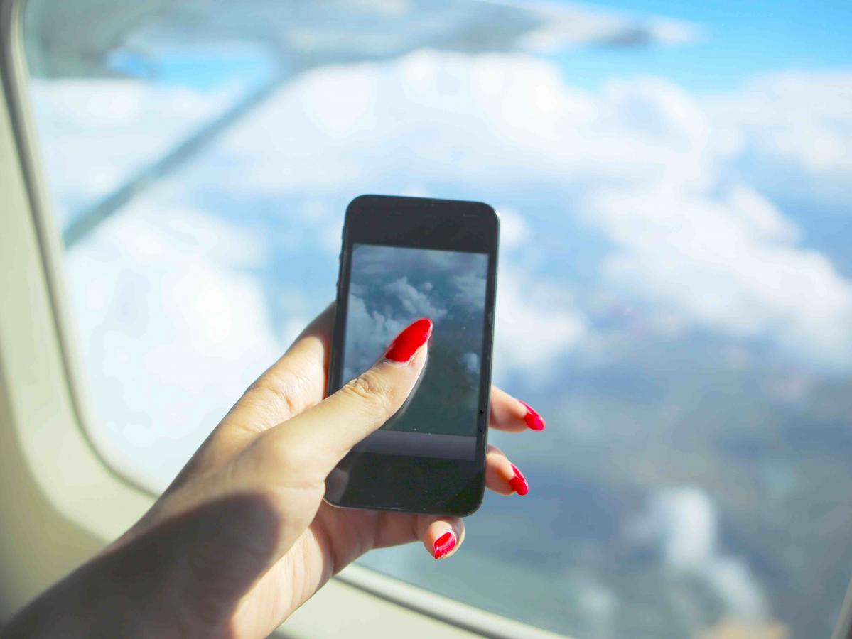 The terrifying reason you should NEVER reach for your phone on a plane ...